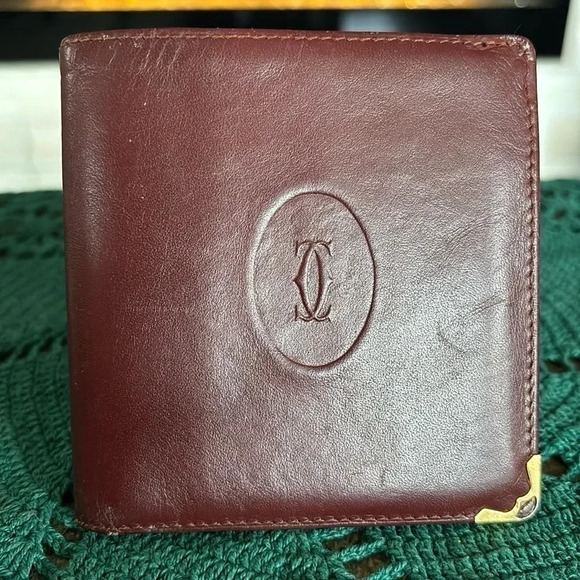 Cartier | Bags | Cartier Must Line Embossed Leather Bifold Wallet ...